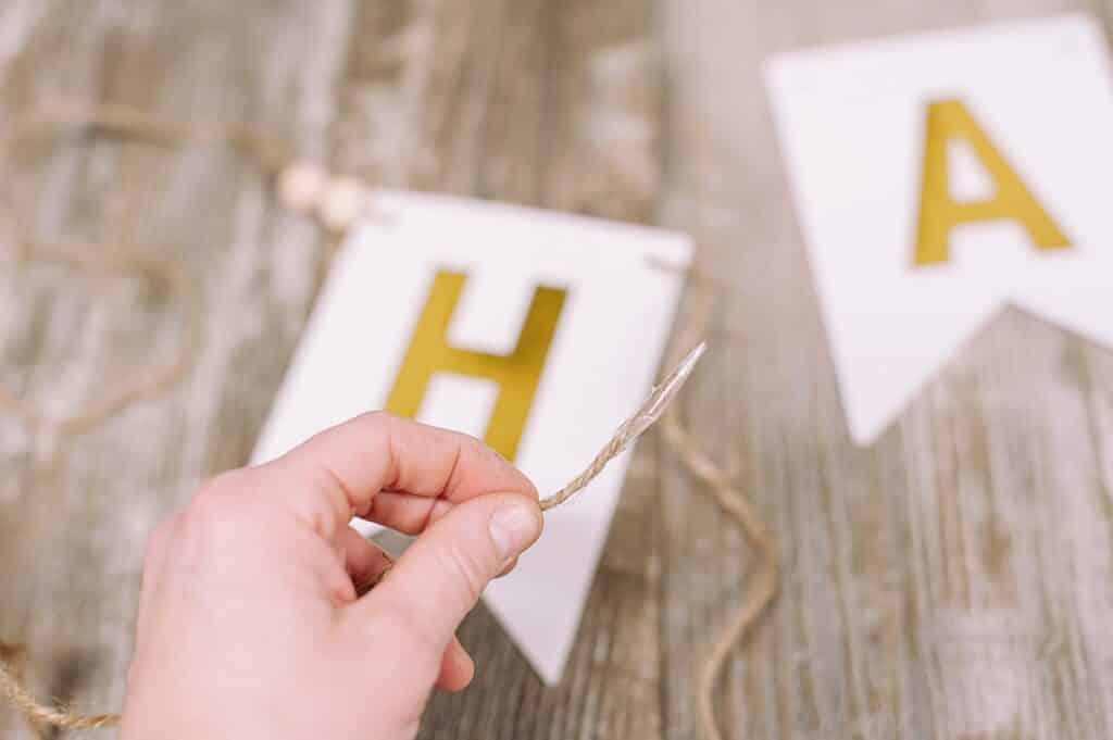 DIY Happy Birthday Banner with Twine and Wood Beads