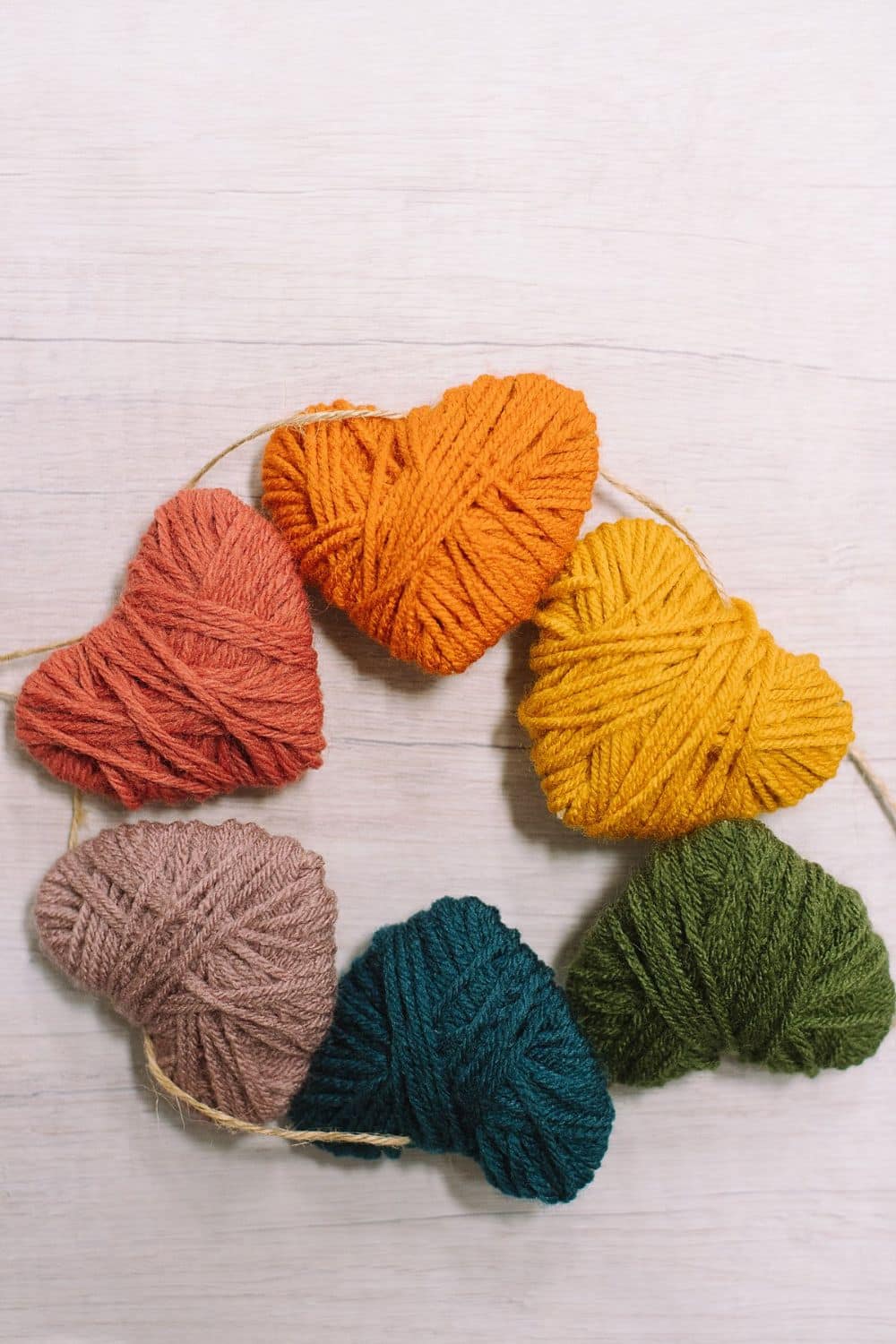 How to Make Yarn Wrapped Hearts | DIY Yarn Hearts - Laura Radniecki