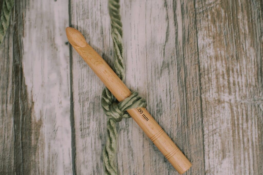 How to Make a DIY Chain Stitch Garland with Chunky Yarn - Laura Radniecki
