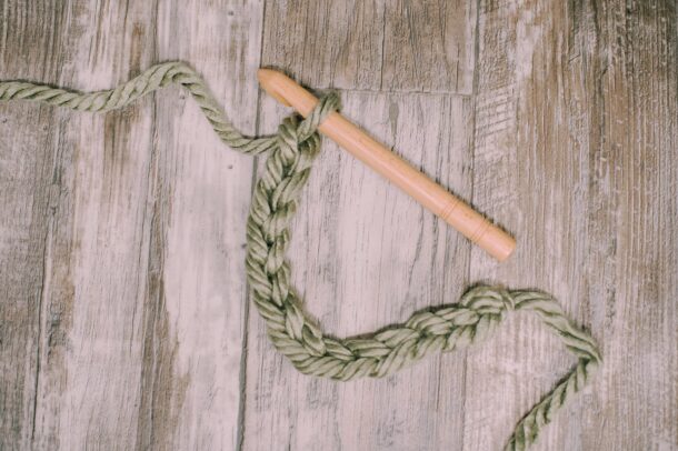 How to Make a DIY Chain Stitch Garland with Chunky Yarn - Laura Radniecki