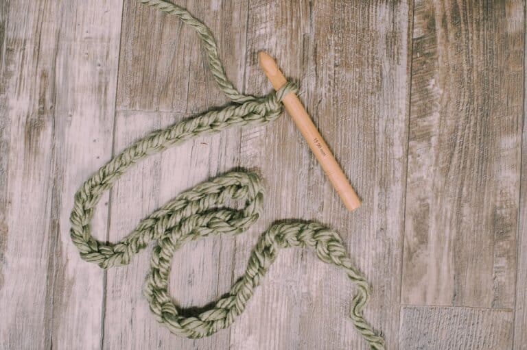 How to Make a DIY Chain Stitch Garland with Chunky Yarn - Laura Radniecki