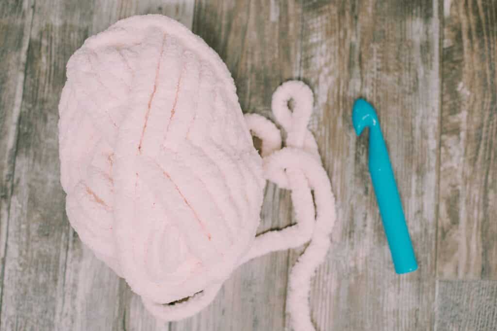 How to Make a DIY Chain Stitch Garland with Chunky Yarn - Laura Radniecki