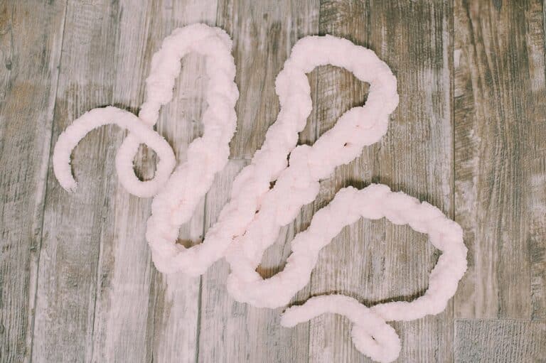 How to Make a DIY Chain Stitch Garland with Chunky Yarn - Laura Radniecki