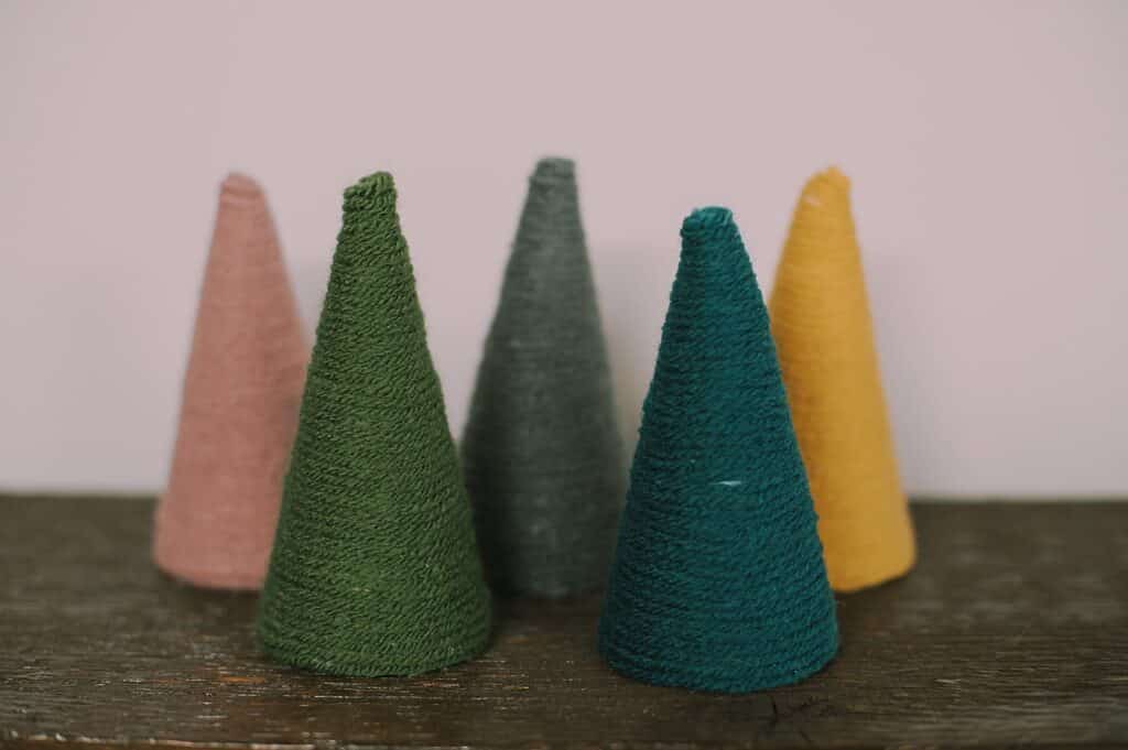 How to Make Yarn-Wrapped Syrofoam Cone Trees for Christmas