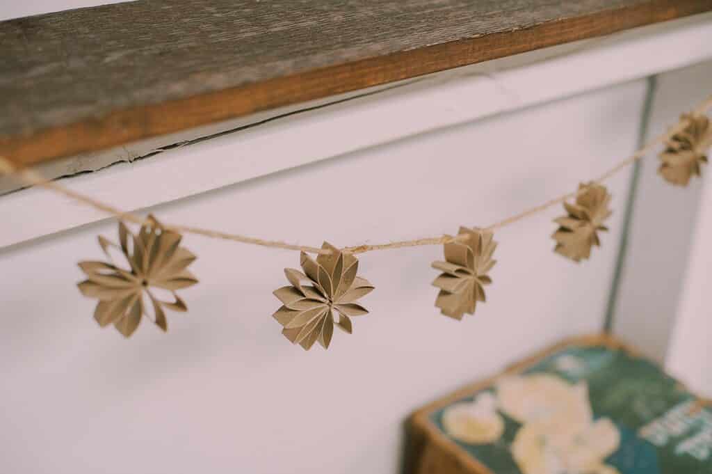 How to Make a Toilet Paper Tube Flower Garland - Laura Radniecki