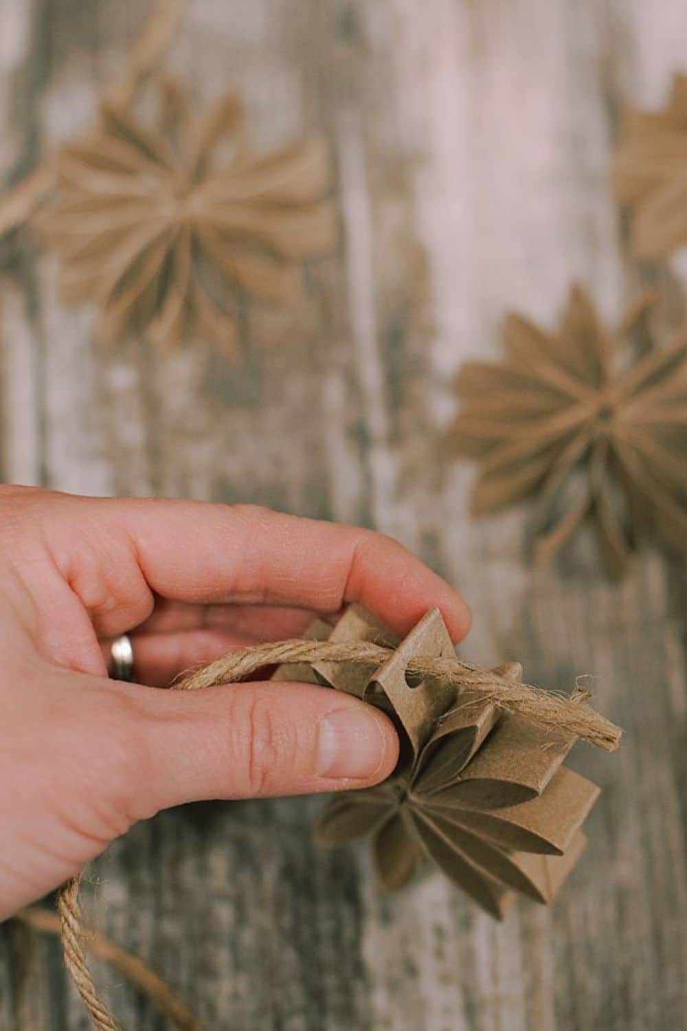 How to Make a Toilet Paper Tube Flower Garland - Laura Radniecki